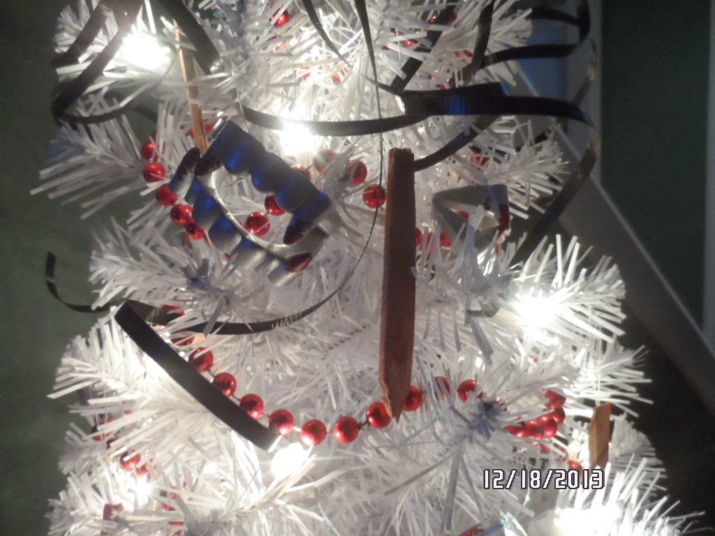 3. I had some sparkly skulls and hot glued them together for a tree ...