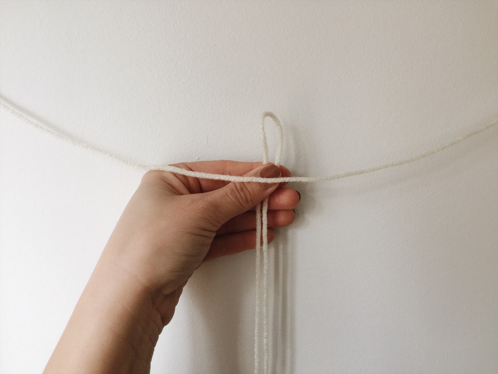 DIY yarn wall hanging