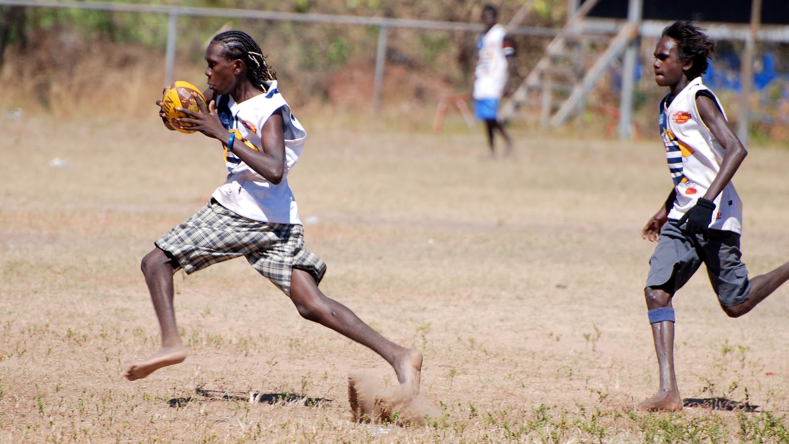 Tofu Photography: A star player running with the ball in a junior AFL ...