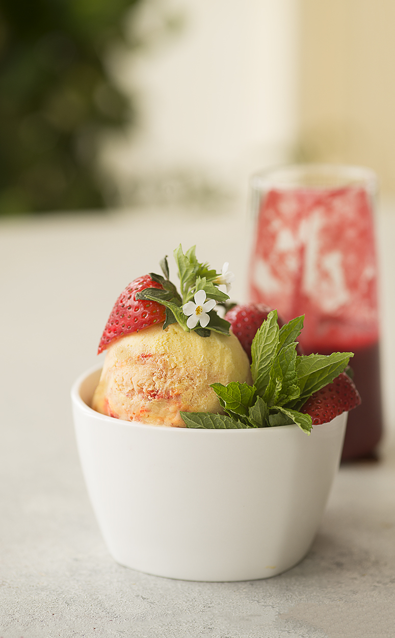Turmeric n spice: Mango ice cream sundae with strawberry compote