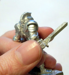 Axes and Arrows: How to pin miniatures
