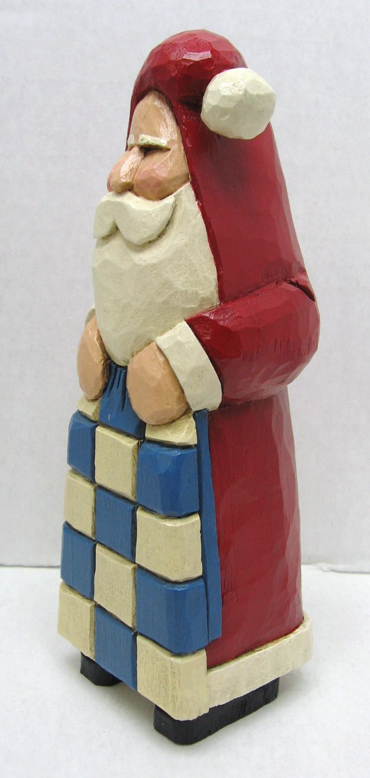 Dougs Carvings: Santa Holding Quilt