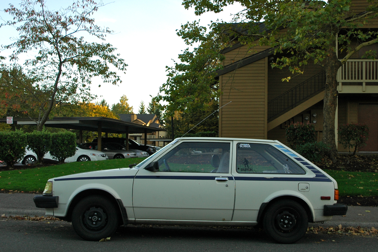 OLD PARKED CARS.: 1984 Mazda GLC.