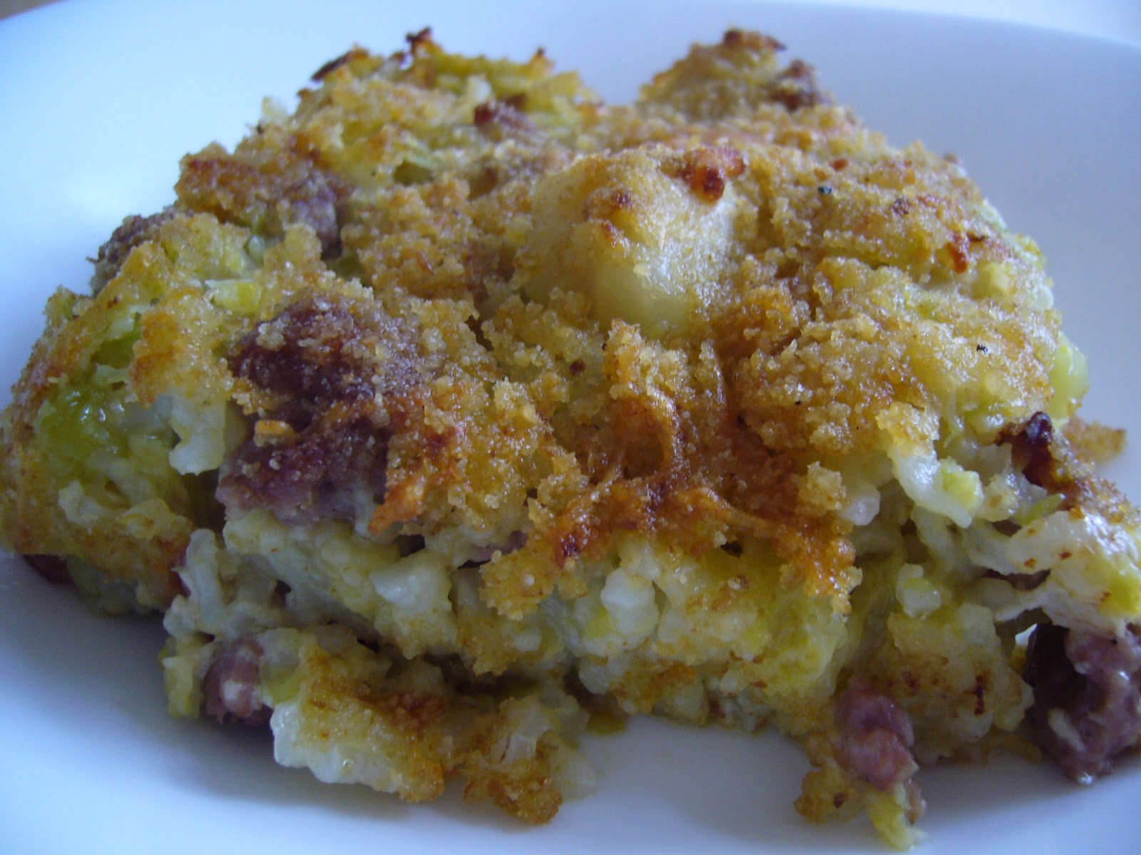 Profumo in Cucina: Riso al forno con verza, salsiccia e fonduta