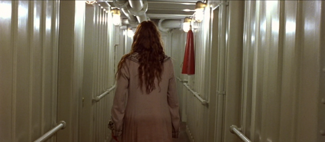 That emptiness turns scary when he cuts to another shot behind her ...