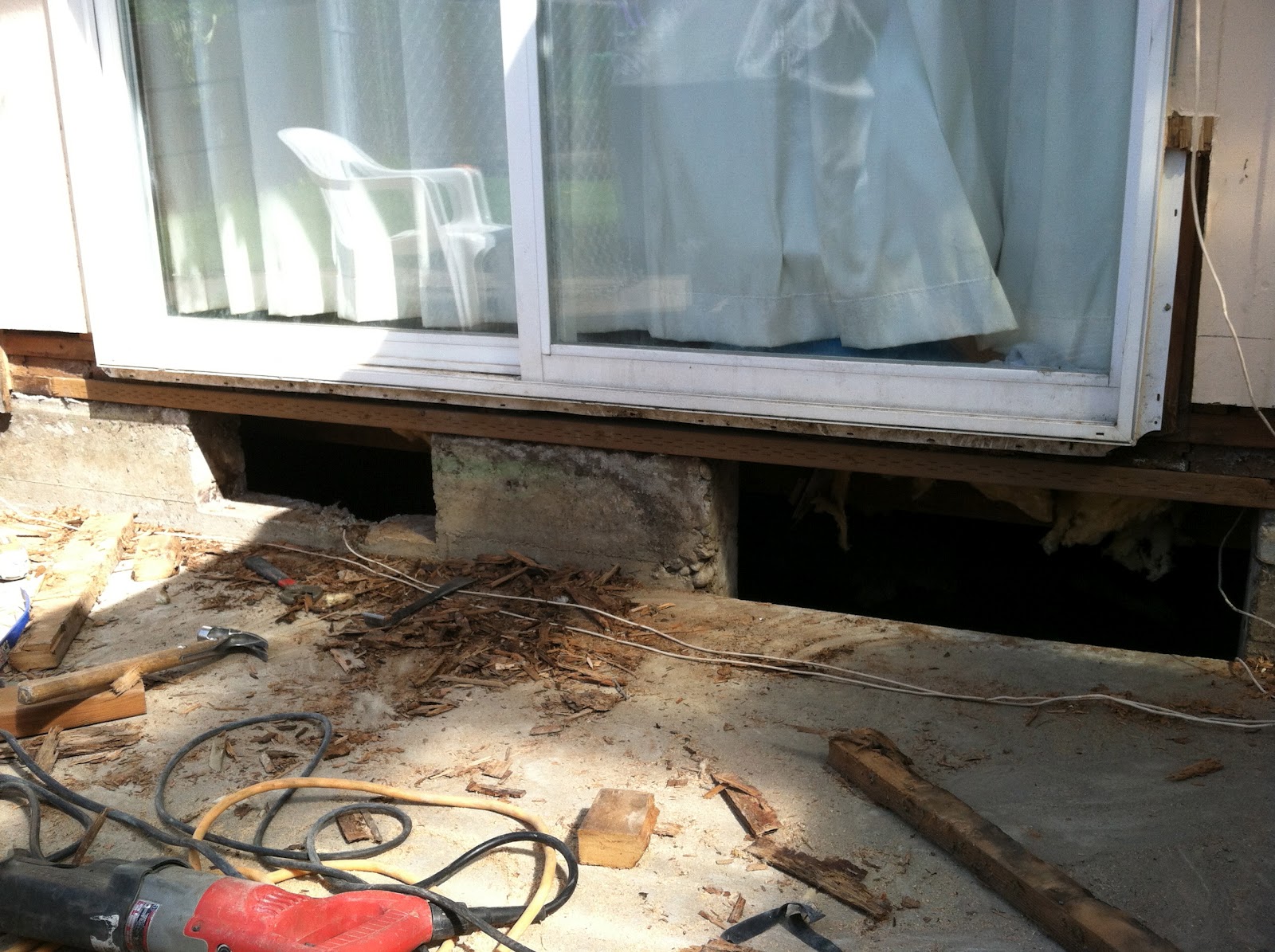 Consider It Done Construction: Dry Rot Damage Under Sliding Glass Door
