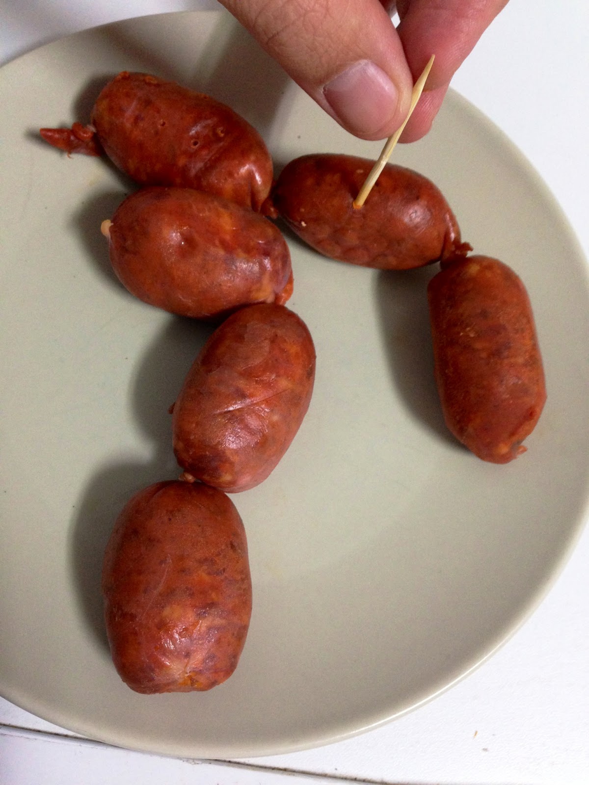 EL RITMO EN LOS FOGONES: CHORICITOS AL VINO