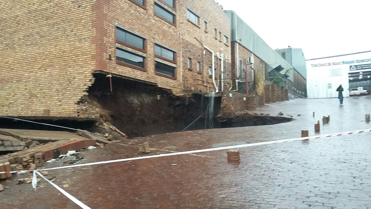 Sciency Thoughts: Sinkholes swallow car and undermine building in the ...