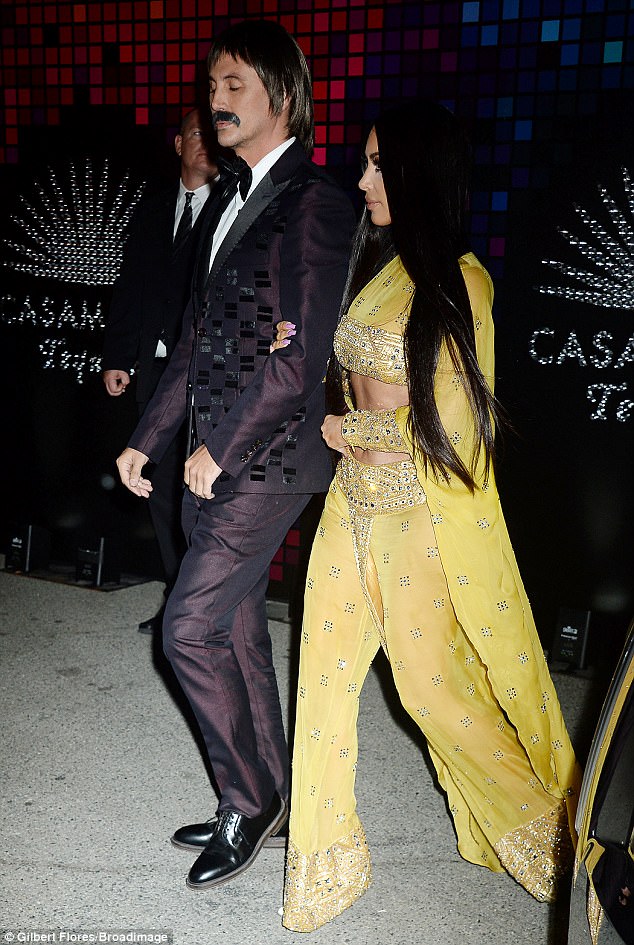 Kim Kardashian is sensational in belly baring outfit for a Halloween ...