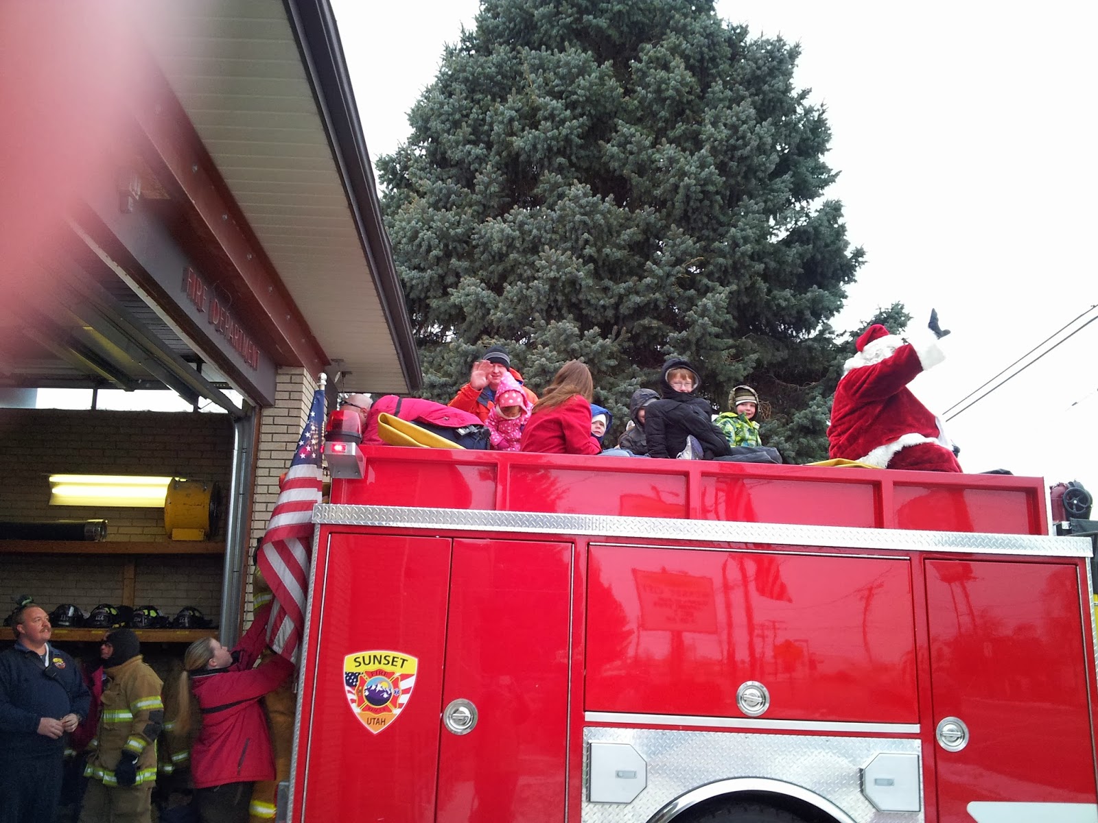 Petersen Family: Riding the Fire Truck with Santa