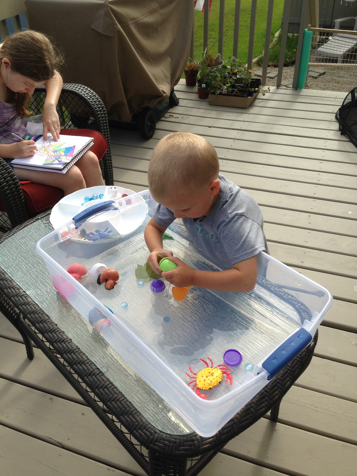 Color My World: Easy to Make Water Table For Daycare Sensory Play