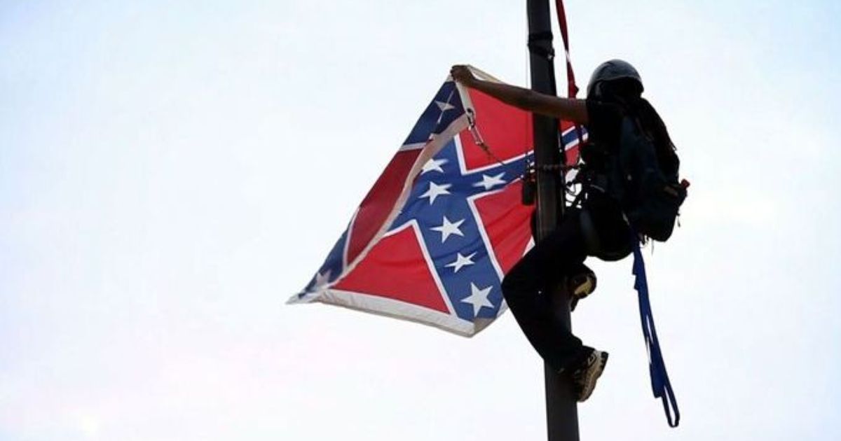 Black Educator: Tou Go Susta! Climbs Flag Pole to Successfully Snatch ...
