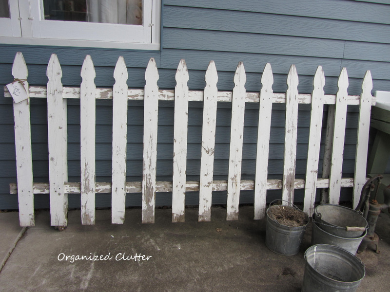 A Junk Garden "Gallery" Fence - Organized Clutter