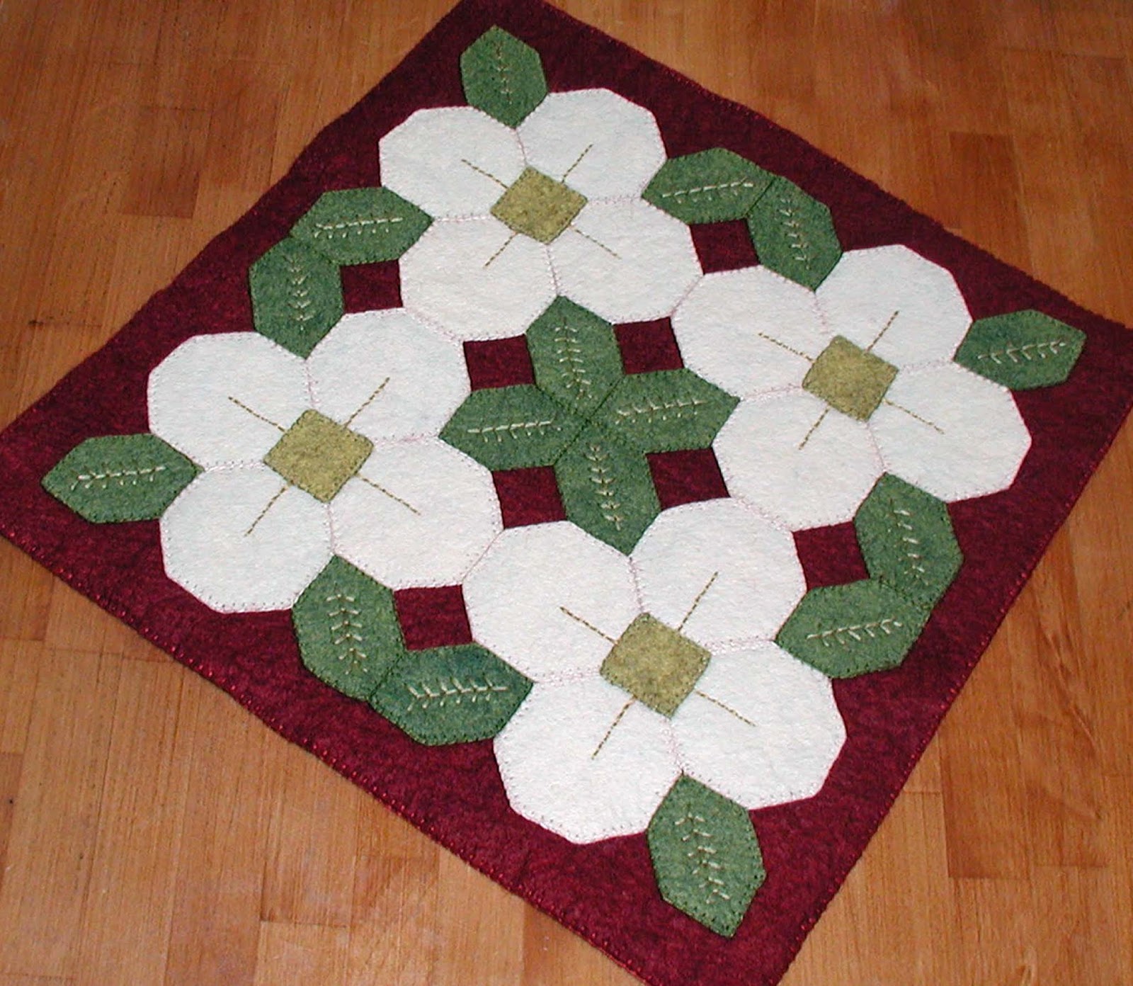 Elizabeth Coughlin Designs: New Pattern -- Holiday Blooms Candle Mat