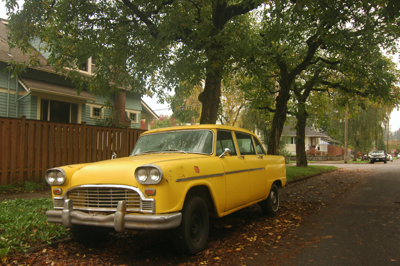 OLD PARKED CARS.: 1968 Checker Marathon.
