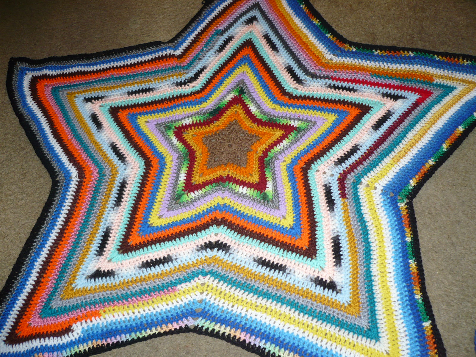 Stitches: Crochet Multi colored star blanket