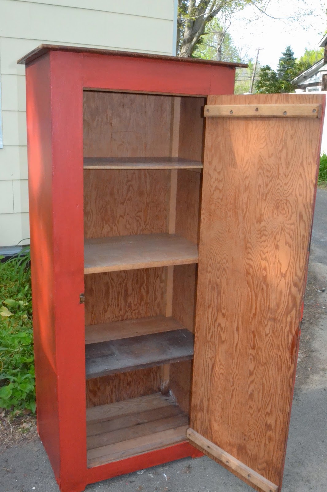 Heir and Space: An Antique Red Cupboard