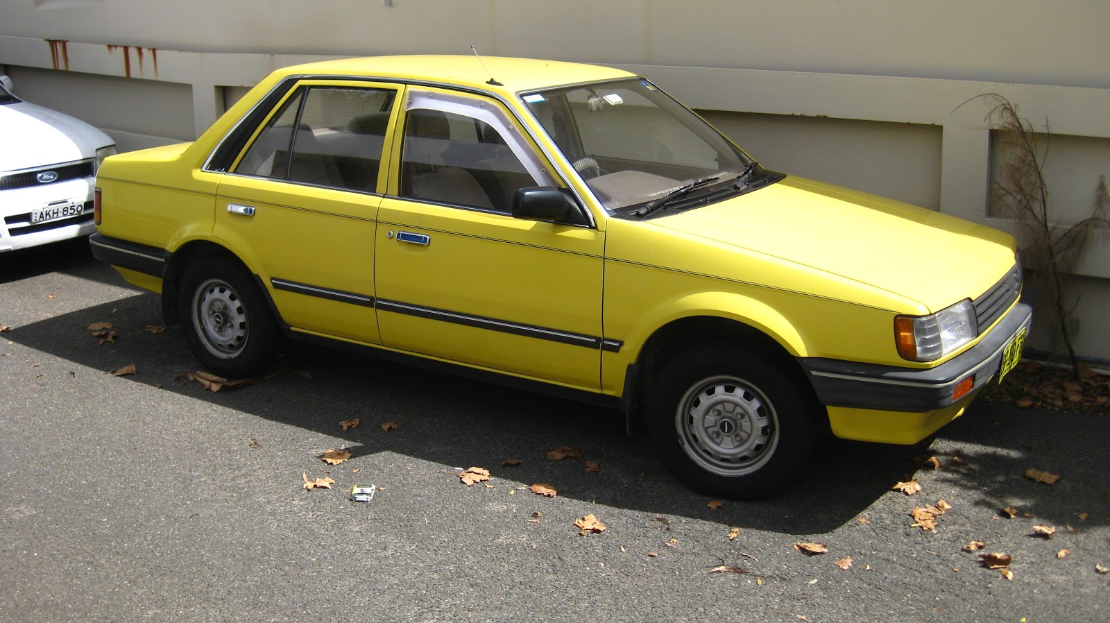 Aussie Old Parked Cars: 1986 Mazda BF 323 1.6 Sedan