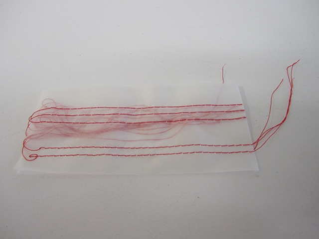 Paper Ponderings: Red thread stitching