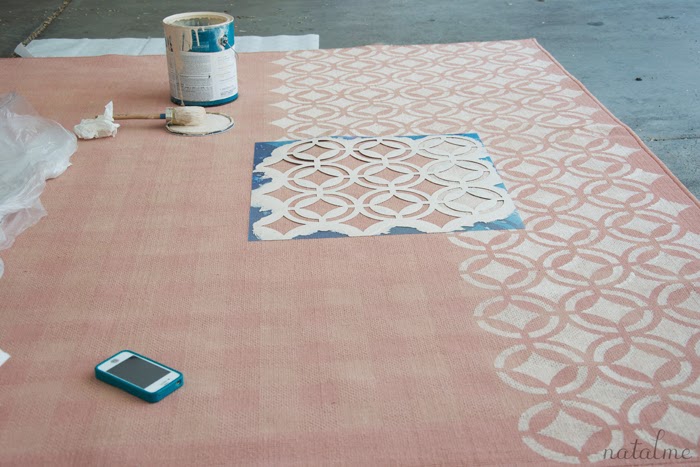 If stamping isn't your thing, you can try stenciling your rug, like ...