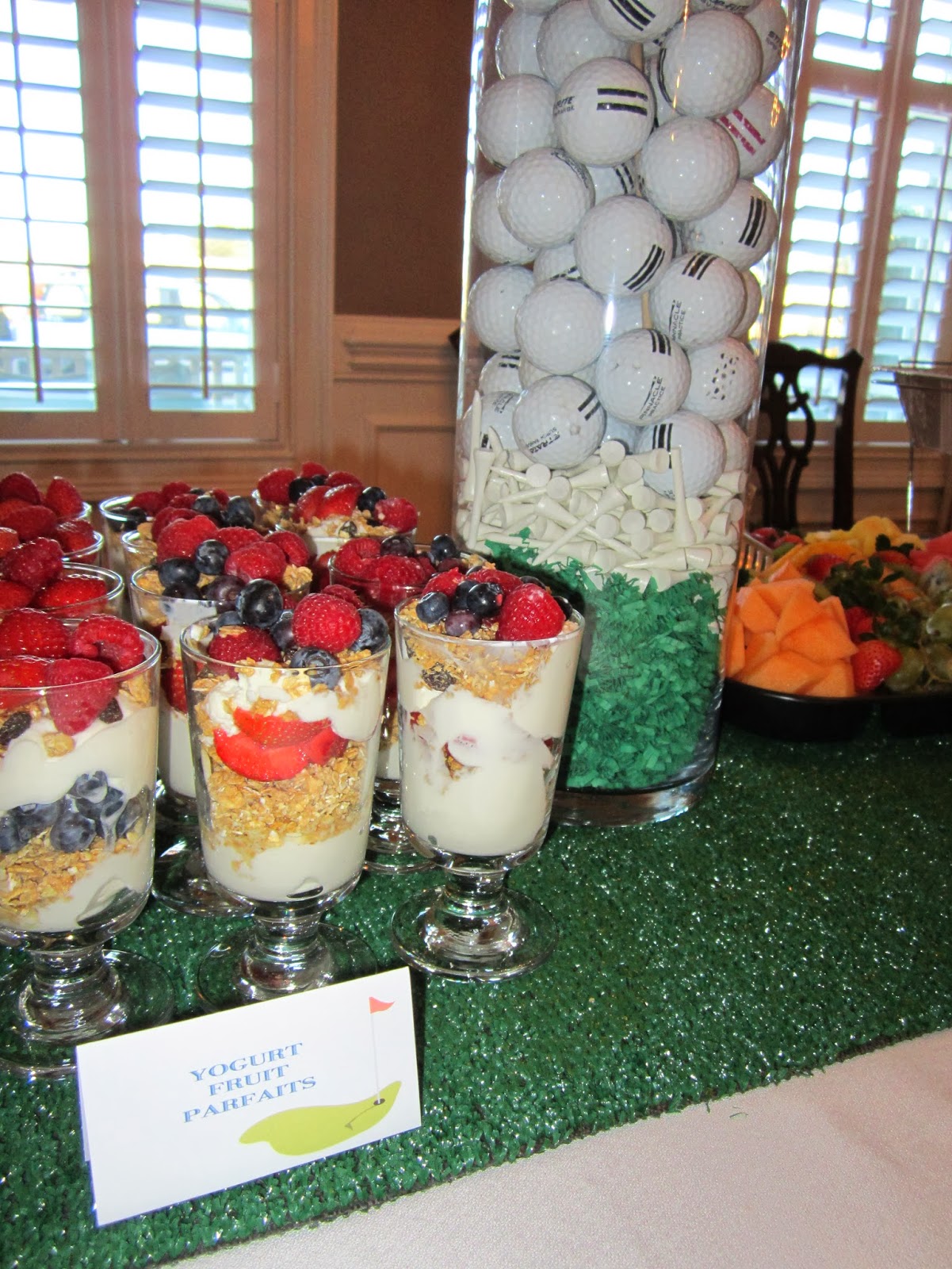golf hole food tents, and silverware wraps with golf balls.
