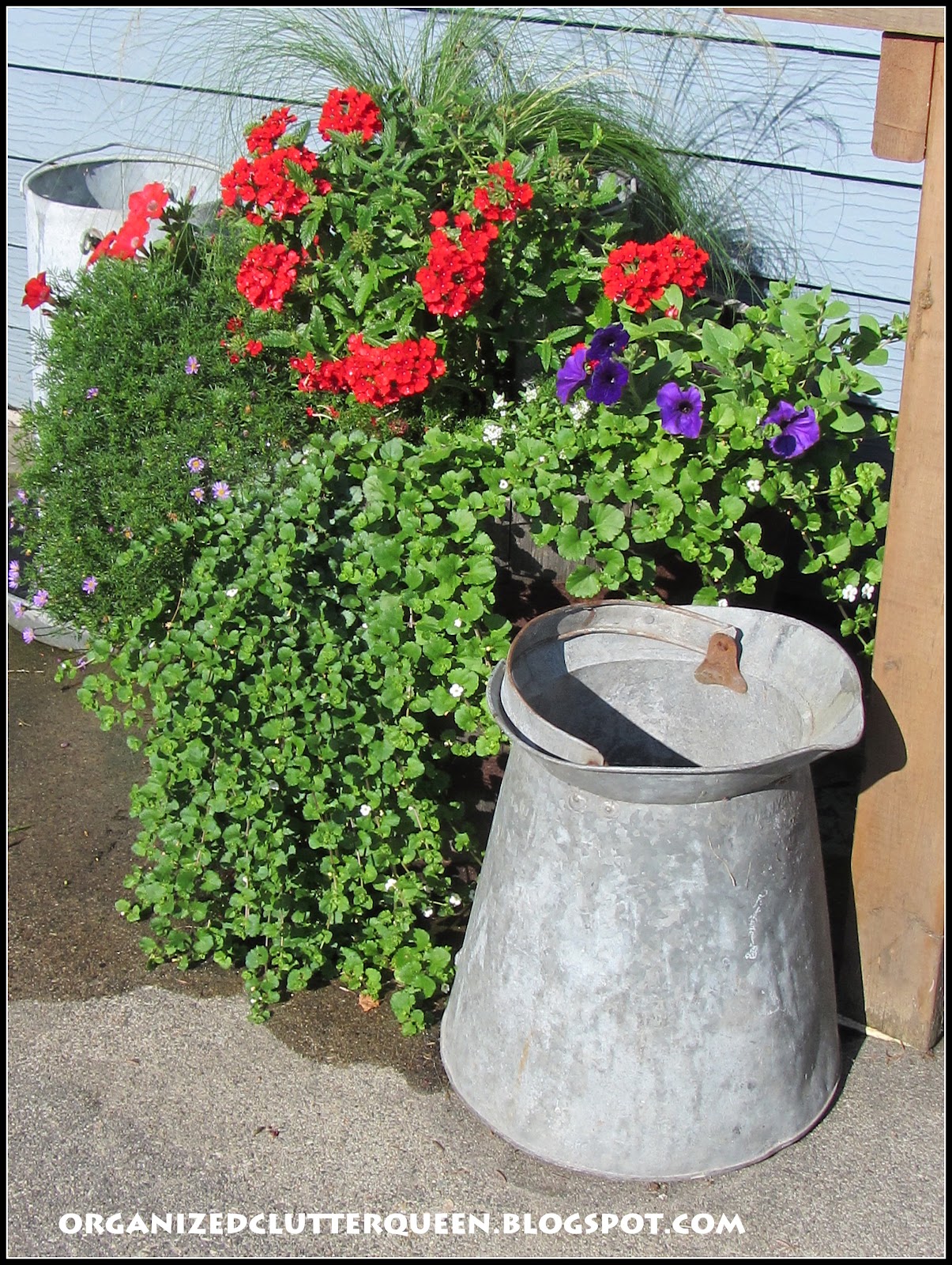 Potting Bench, Whiskey Barrels, and Hanging Pails - Organized Clutter