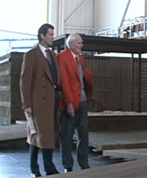 A Double-Breasted Overcoat in Hamburg in Tomorrow Never Dies – Bond Suits