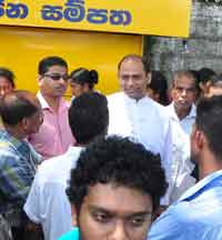 FATHER PROTESTS ON A HUGE 'MAARA' TREE AT KOTTAWA