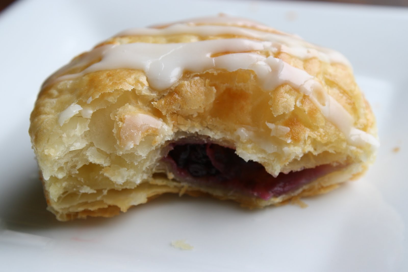Gorgeous Gourmet: Fruit-Filled Puff Pastry Donuts with Lemon Glaze