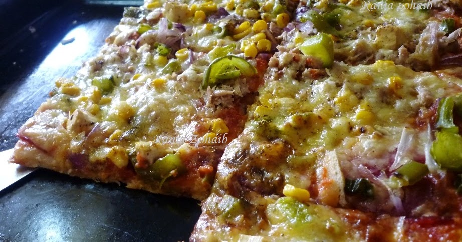Rania @ Work with sugar'n spice: Tuna-Vegetable Cheeeeezy Pizzzzza :)
