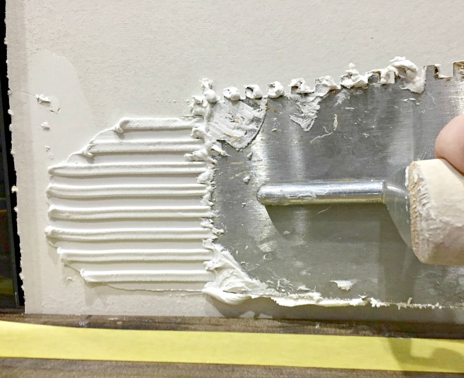 How to Install Stacked Stone Tile on a Fireplace | Thrifty Decor Chick ...