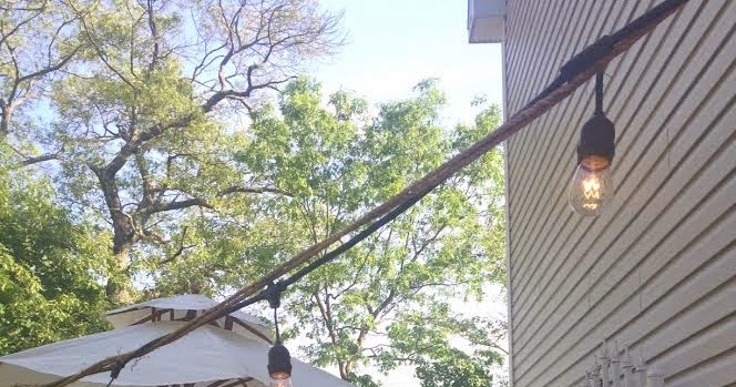 Maison Decor: Our al fresco dining courtyard takes shape with string lights