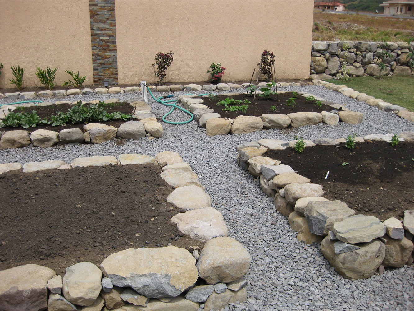 T.R. Services S.A.: Stone Vegetable Patch