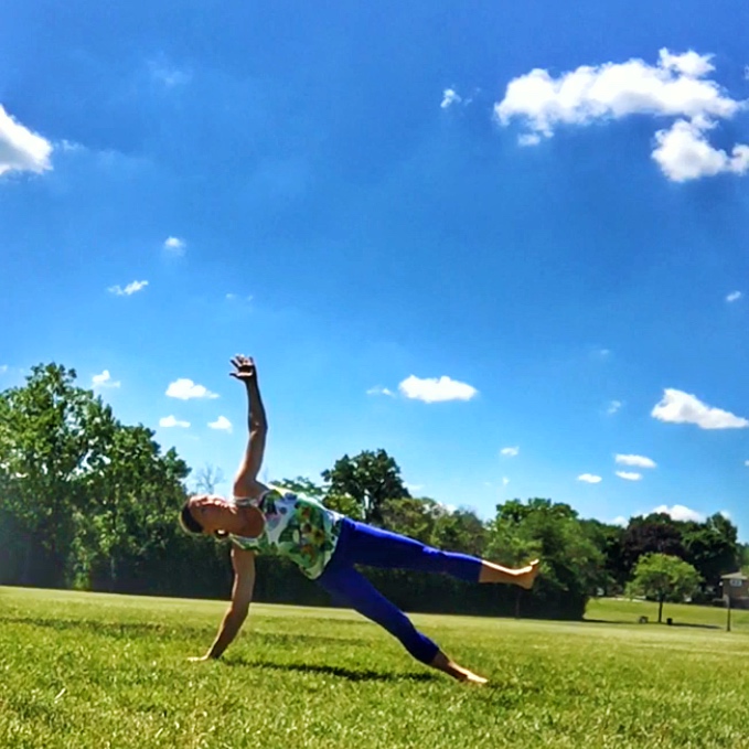 Flip to your back, placing your top leg on the ground and reaching your ...