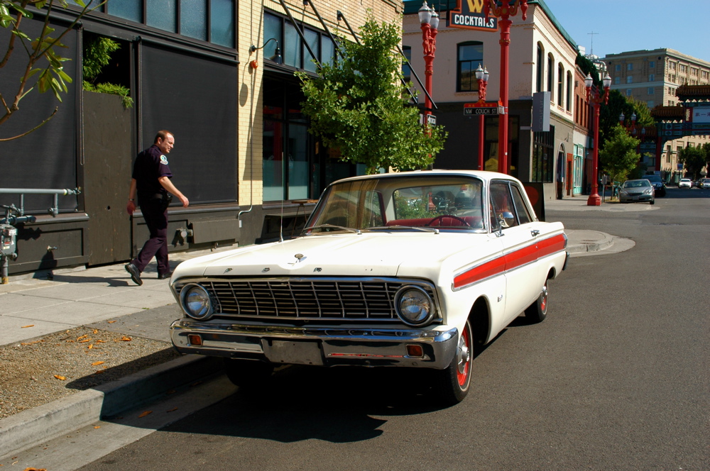 OLD PARKED CARS.: 1964 Ford Falcon Futura 2-Door Sedan.