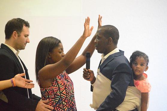 Photos: Nigerian Pastor Carries Baby On His Back While Preaching In ...