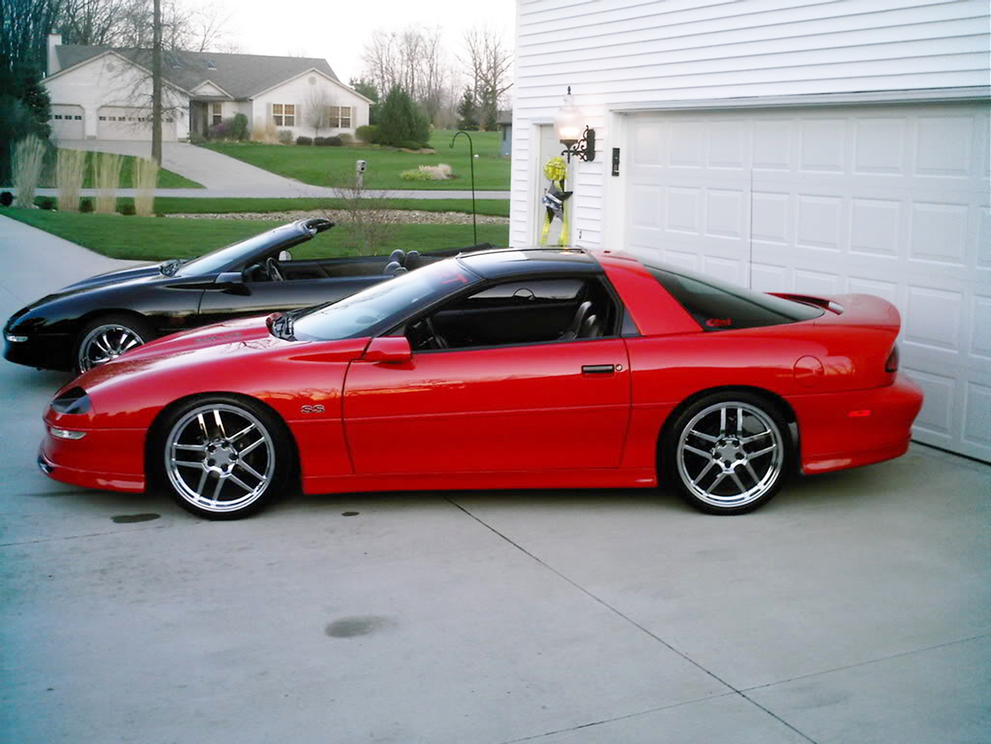 The World's Best 4th Gen Camaros: 97 Red Camaro SS LT1 on 20s