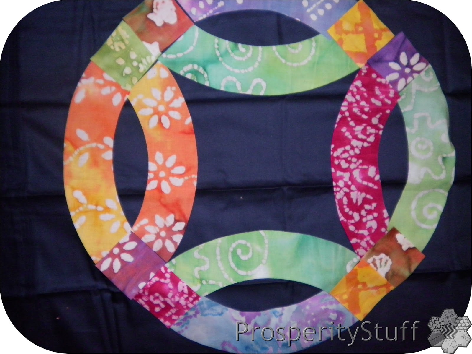 ProsperityStuff Quilts: That Batik Modern Double Wedding Ring Quilt