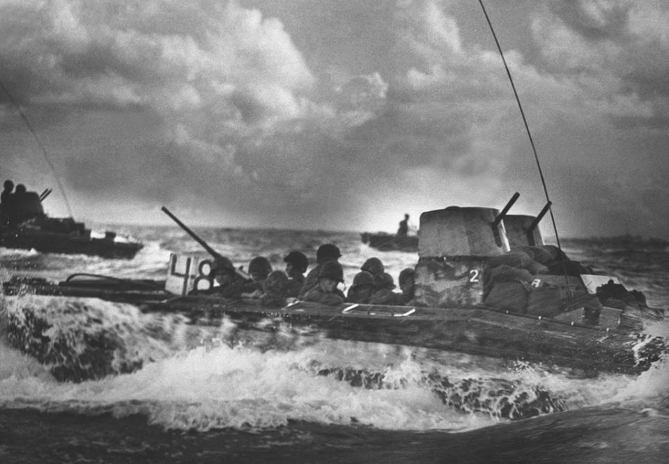 World War II History: A Water Buffalo, loaded with Marines, churns ...