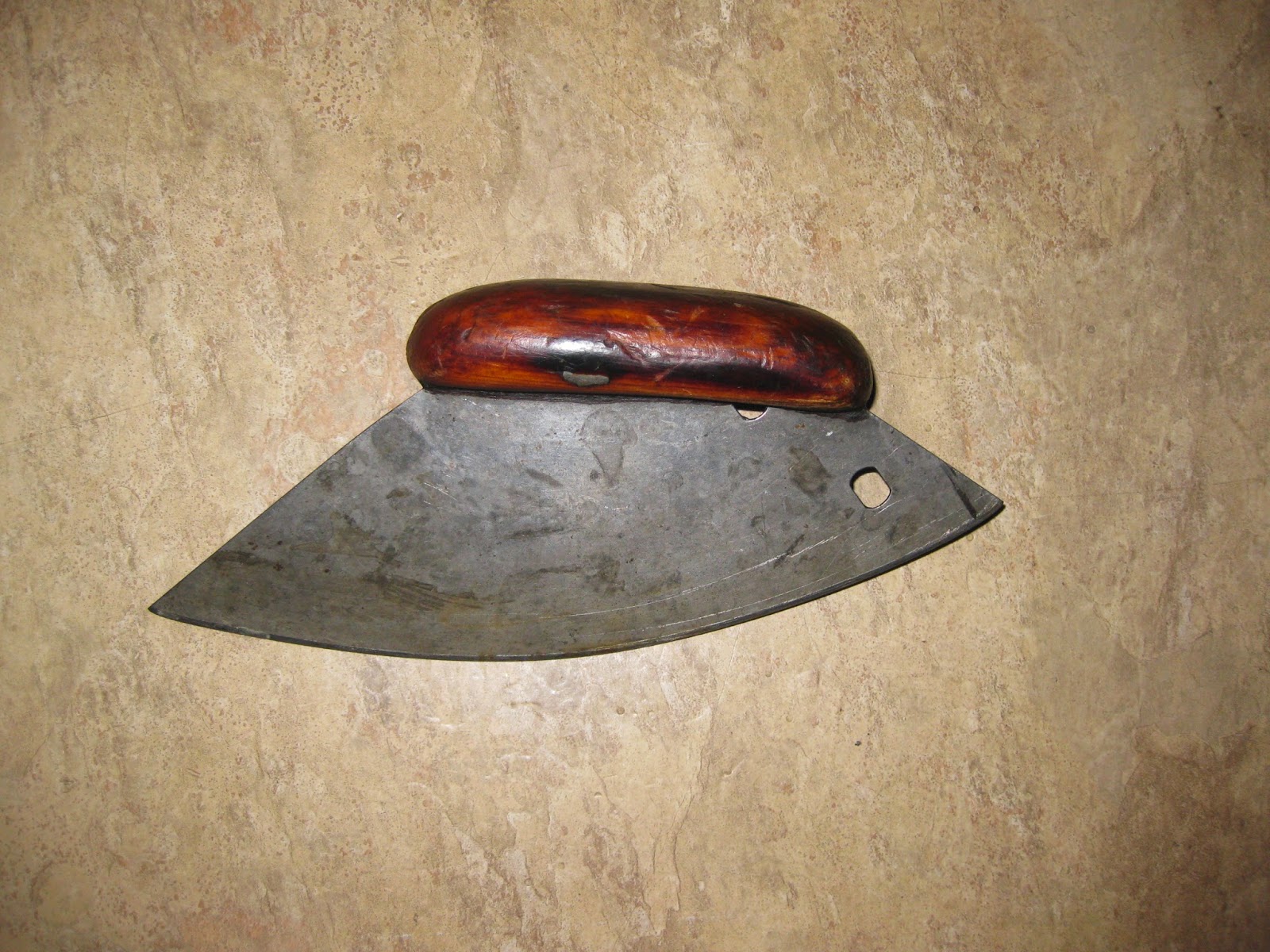 Iglaaq - Traveler; Newly Arrived Guest: THE ULU: A SYMBOL OF INUPIAQ ...
