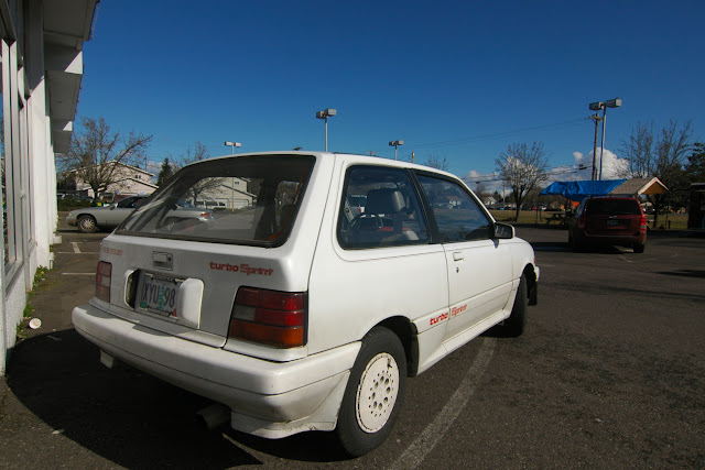 OLD PARKED CARS.: 1987 Chevy Turbo Sprint.