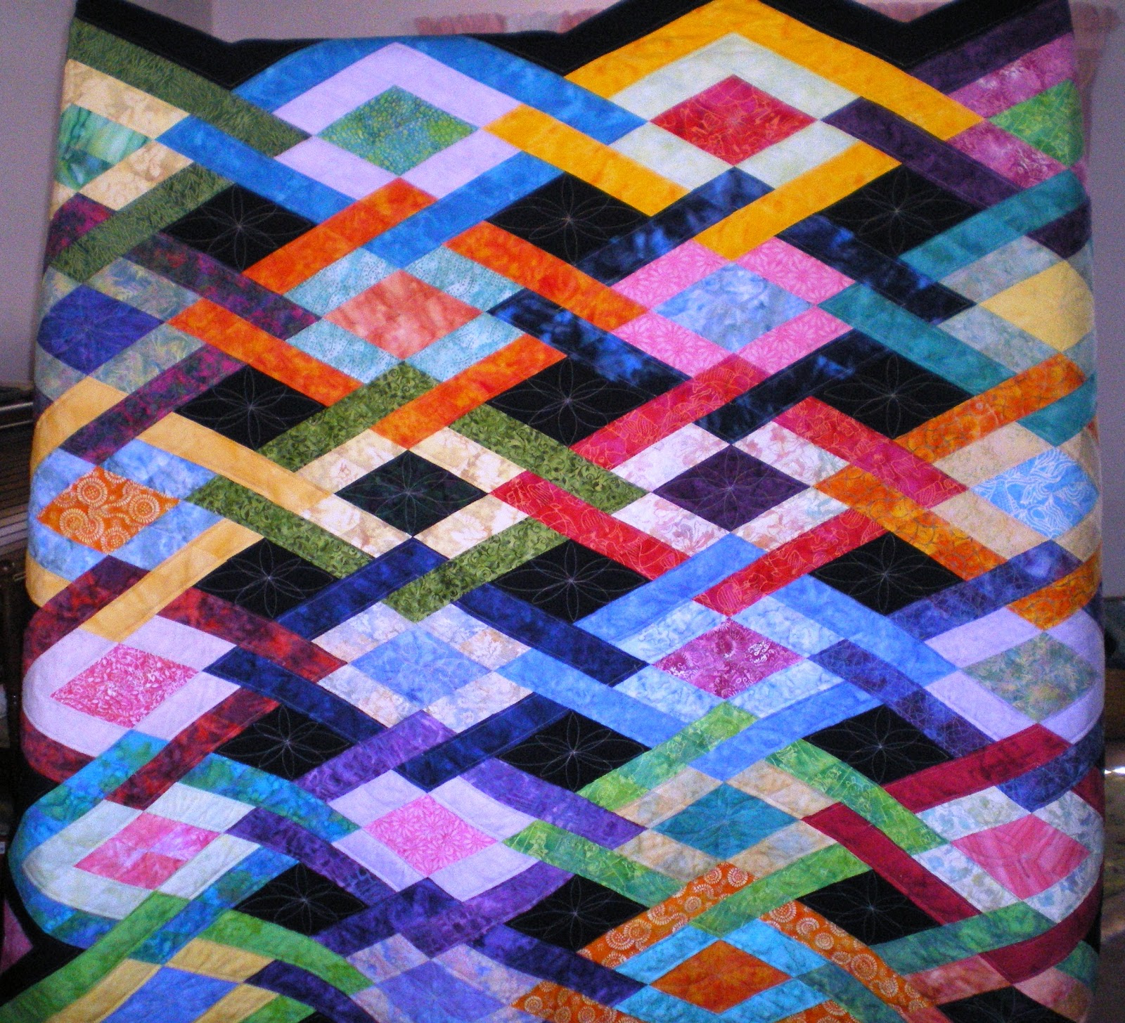 Morning Glory Designs: Argyle quilt finished