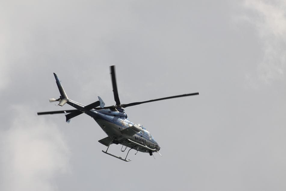 Michigan Exposures: A State Police Helicopter Passes Overhead