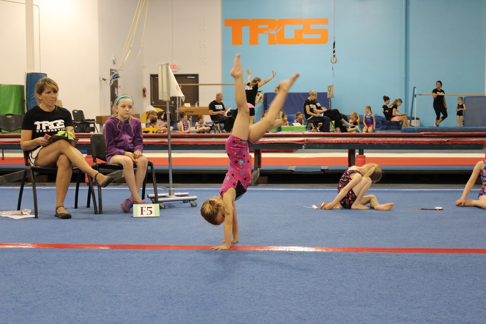 two daughters, one son: spring gymnastics meet 2013