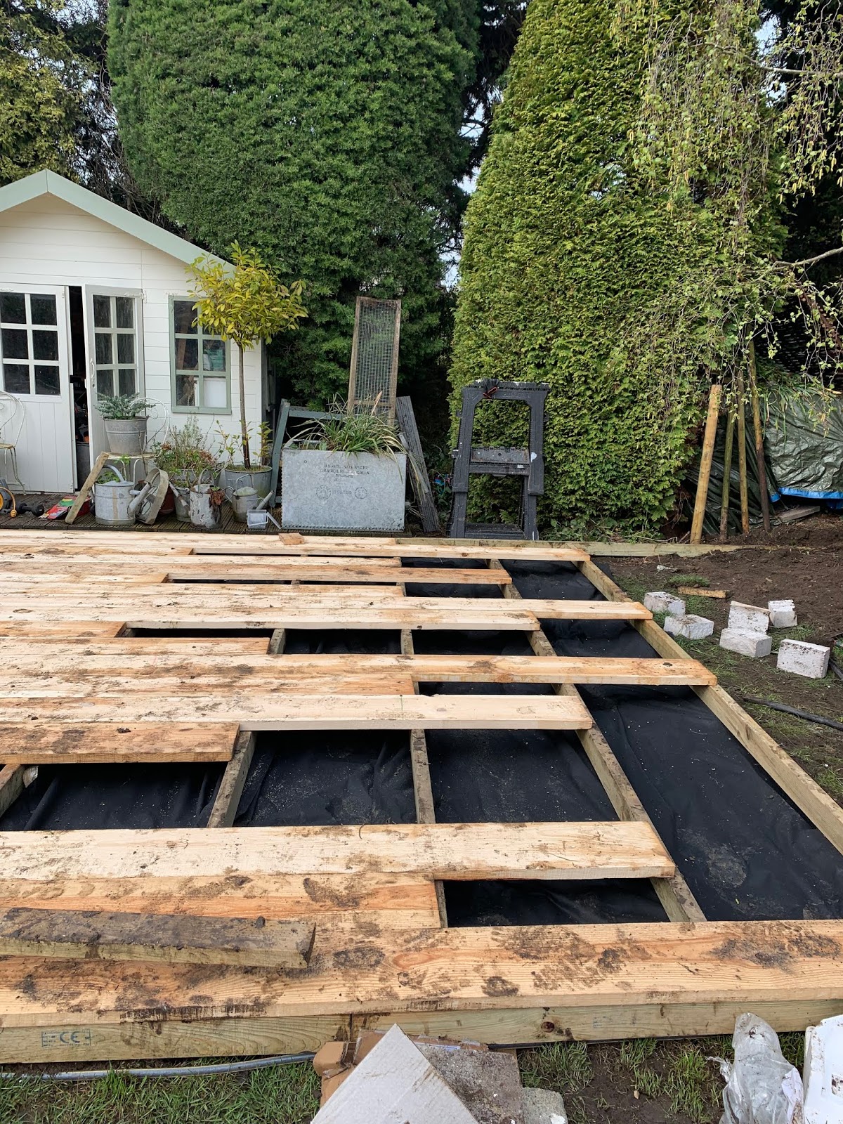 Garden // Building a Scaffold Board Deck & Clad Fence - Roses and Rolltops