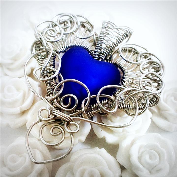 Handmade wire wrapped, filigree, fantasy and steampunk jewelry.