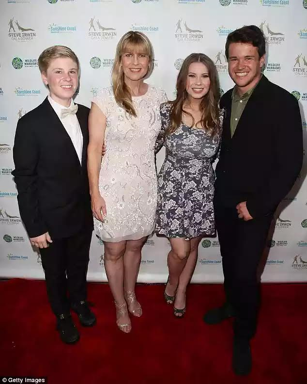 Irwin family attend gala in honour of their late father with a snake in tow