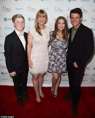 Irwin family attend gala in honour of their late father with a snake in tow