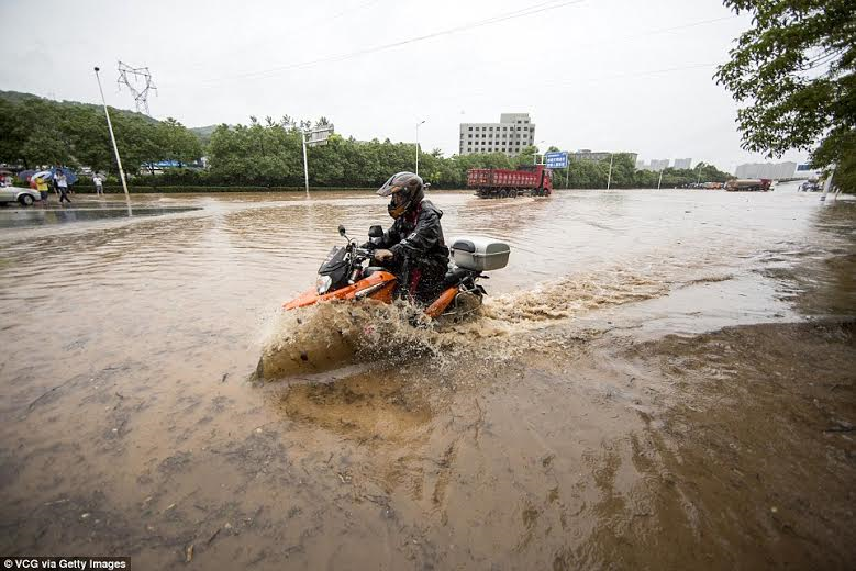 Photos: Week of torrential rains trigger severe floods and landslides ...