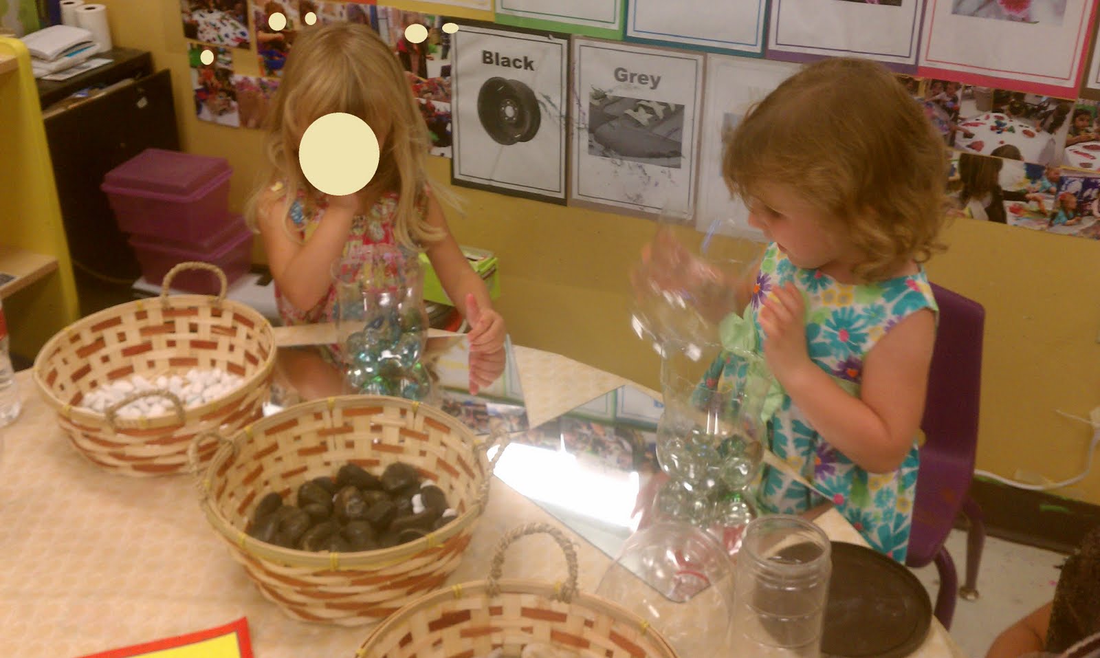 Play-Based Classroom: Recycled plastic bottles, mirrors, and loose parts
